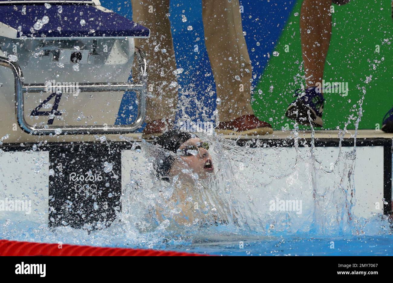 United States' Lilly King celebrates winning the gold medal in the ...