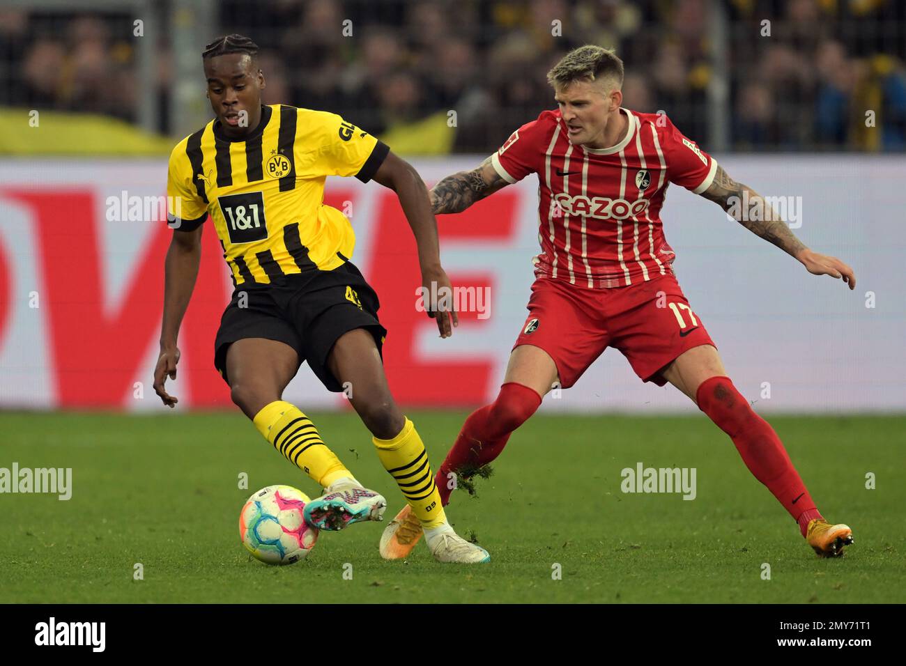 DORTMUND - (lr) Jamie Bynoe Gittens of Borussia Dortmund, Lukas Kubler ...