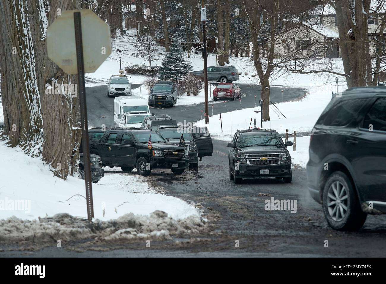 Vehicles in President Joe Biden's motorcade wait outside a private ...