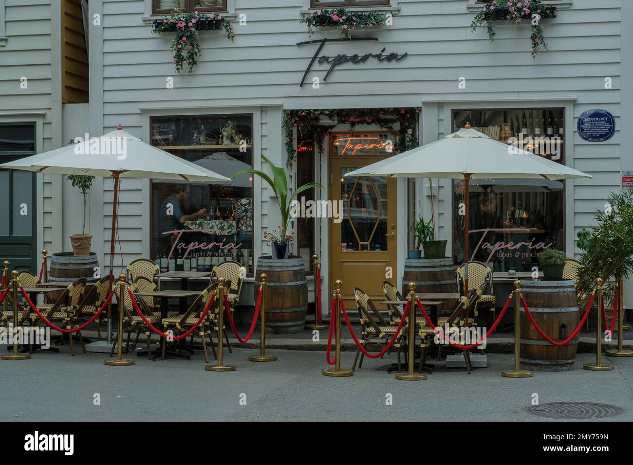 A beautiful view of an outdoor cafe in the walk side in Bergen city ...
