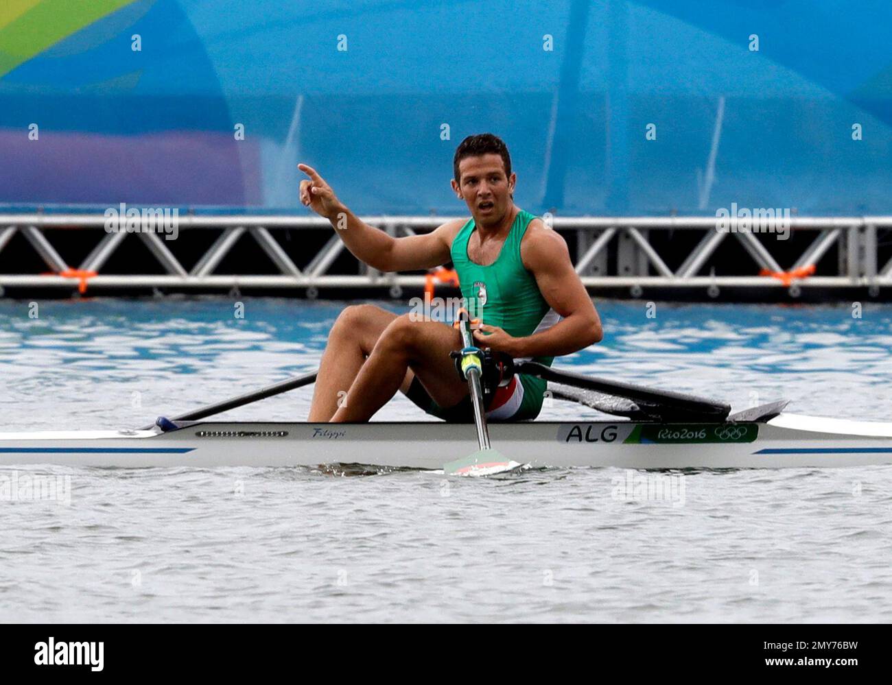 Sid Ali Boudina, of Algeria, reacts after competing in the men's repechage heat during the 2016 ...