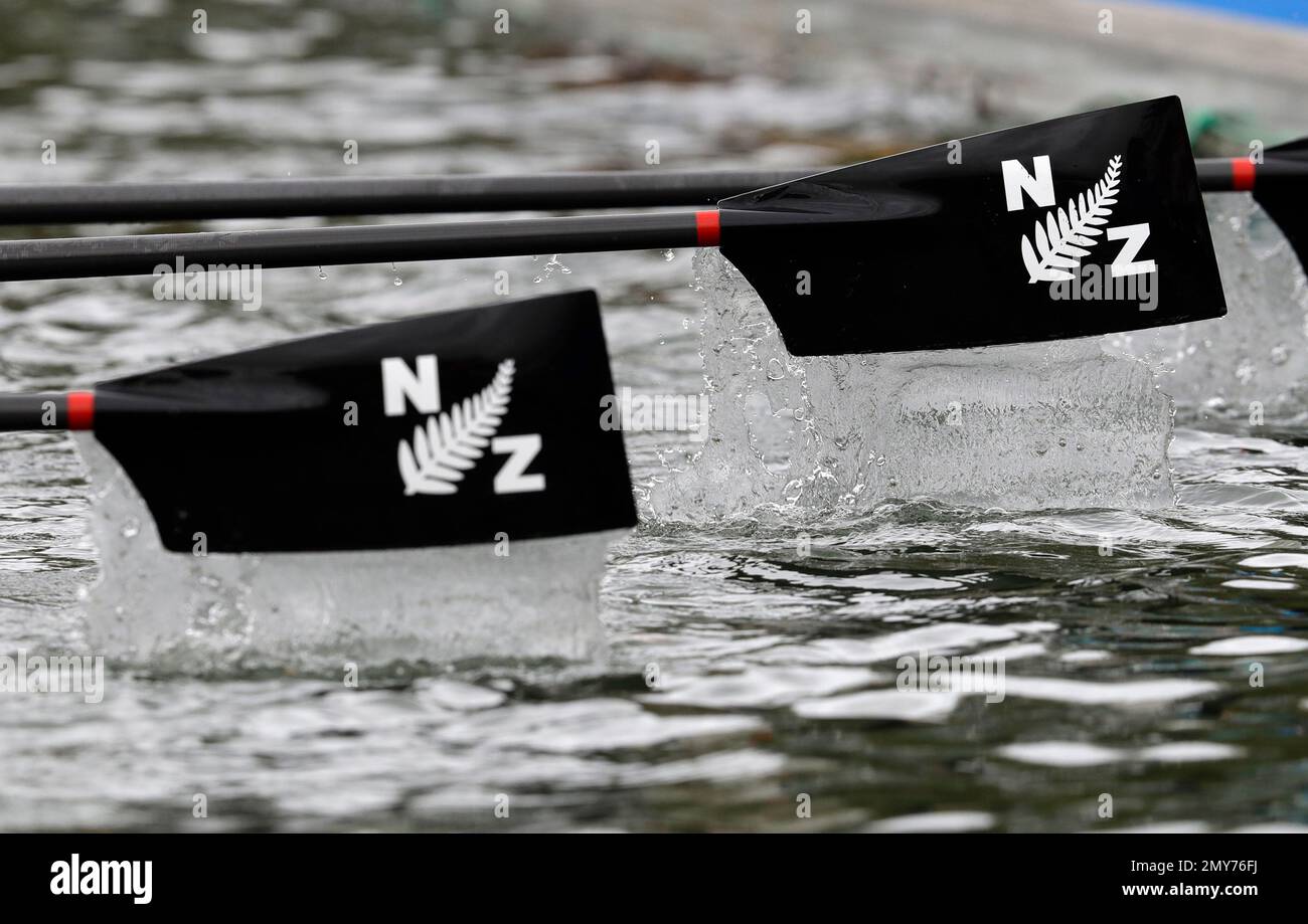 Oars from New Zealand quadruple rowing team break the water competes in ...