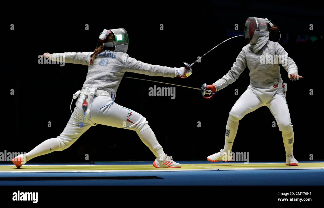 Ursula Gonzalez Garate of Mexico, left, competes with Julieta Toledo of ...