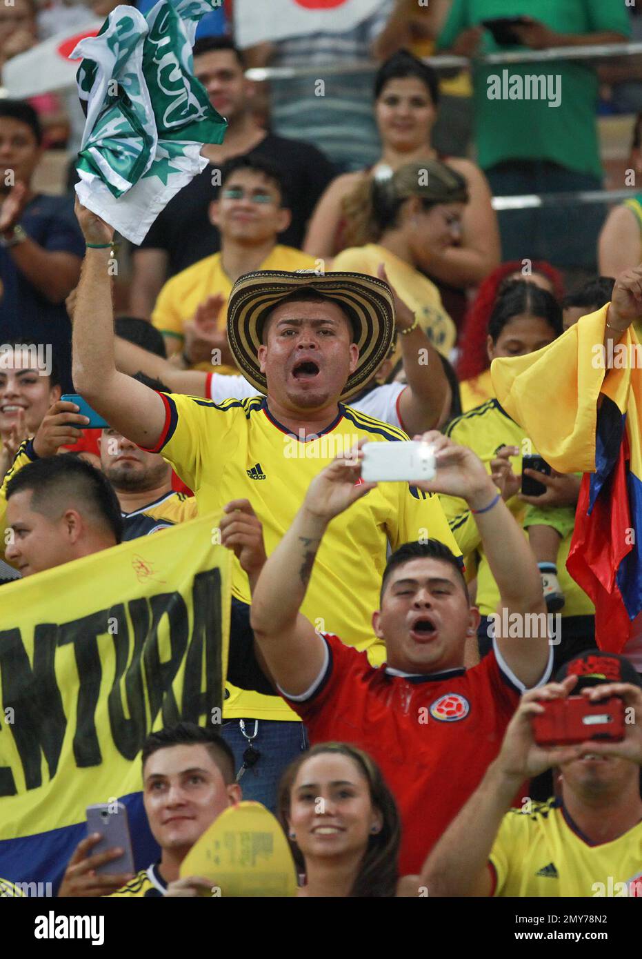 Fans of Colombia cheer for their team prior a group B match of the men ...