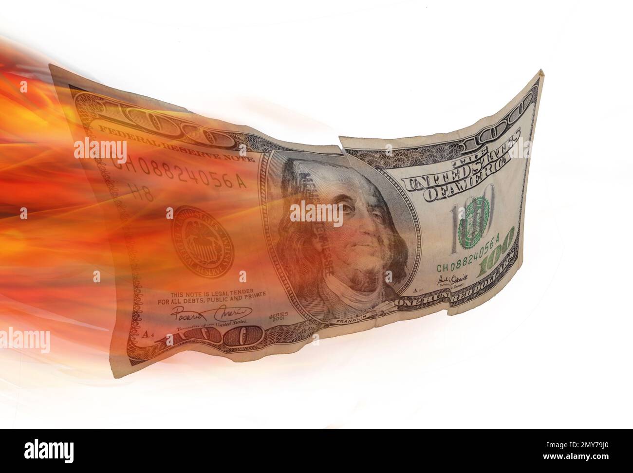 Money on fire and burning away Stock Photo - Alamy