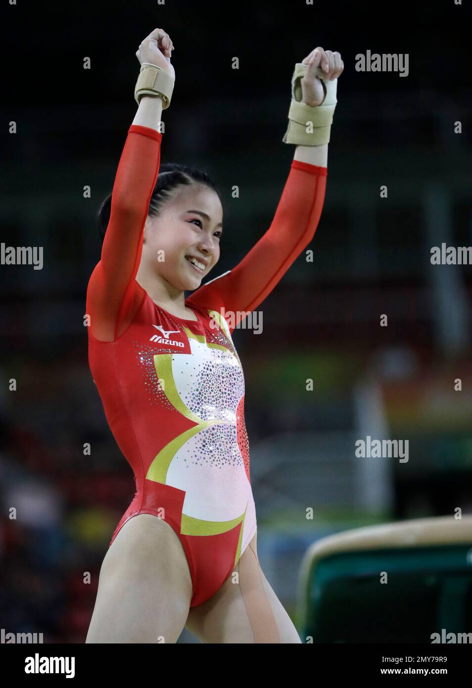 Japan's Aiko Sugihara celebrates after her routine on the vault during ...