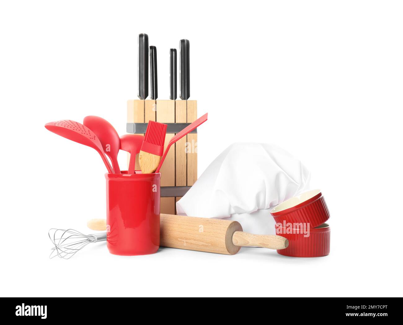 Set of different cooking utensils and chef's hat on white background ...