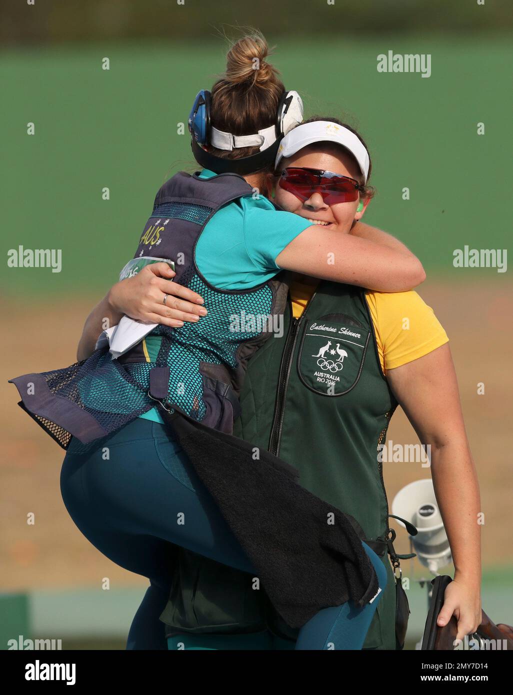 Catherine Skinner, right, of Australia celebrates her victory with her ...