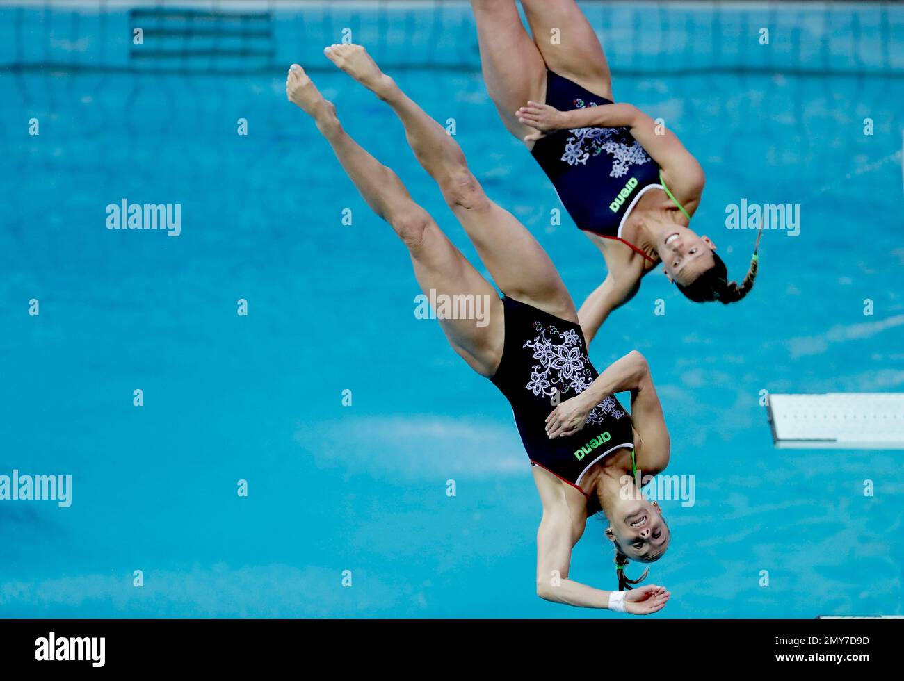 Italy's Tania Cagnotto, bottom, and Francesca Dallape compete during ...
