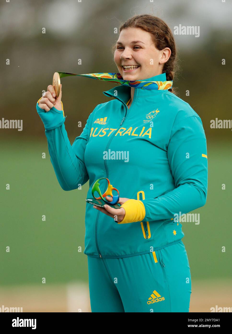 Catherine Skinner of Australia displays her gold medal following the ...