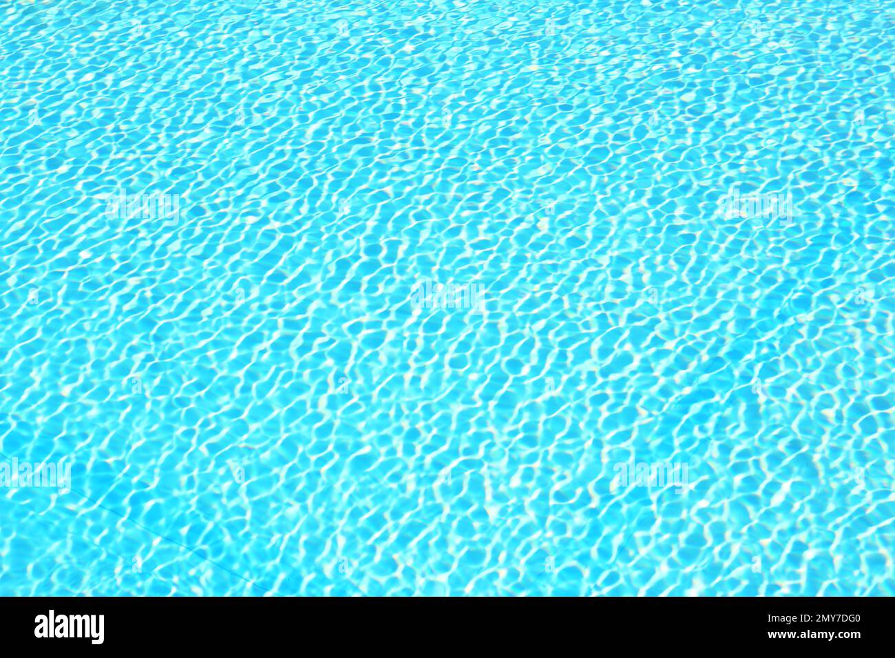 Swimming pool with clear water as background Stock Photo - Alamy