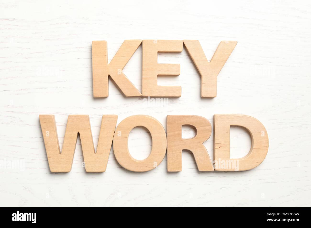 Word KEYWORD made of wooden letters on white background, flat lay Stock ...