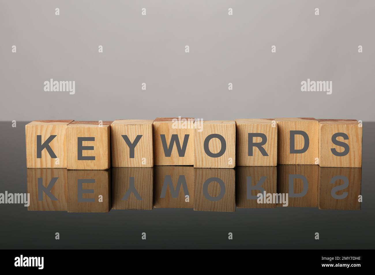Wooden cubes with word KEYWORDS on light grey background Stock Photo ...