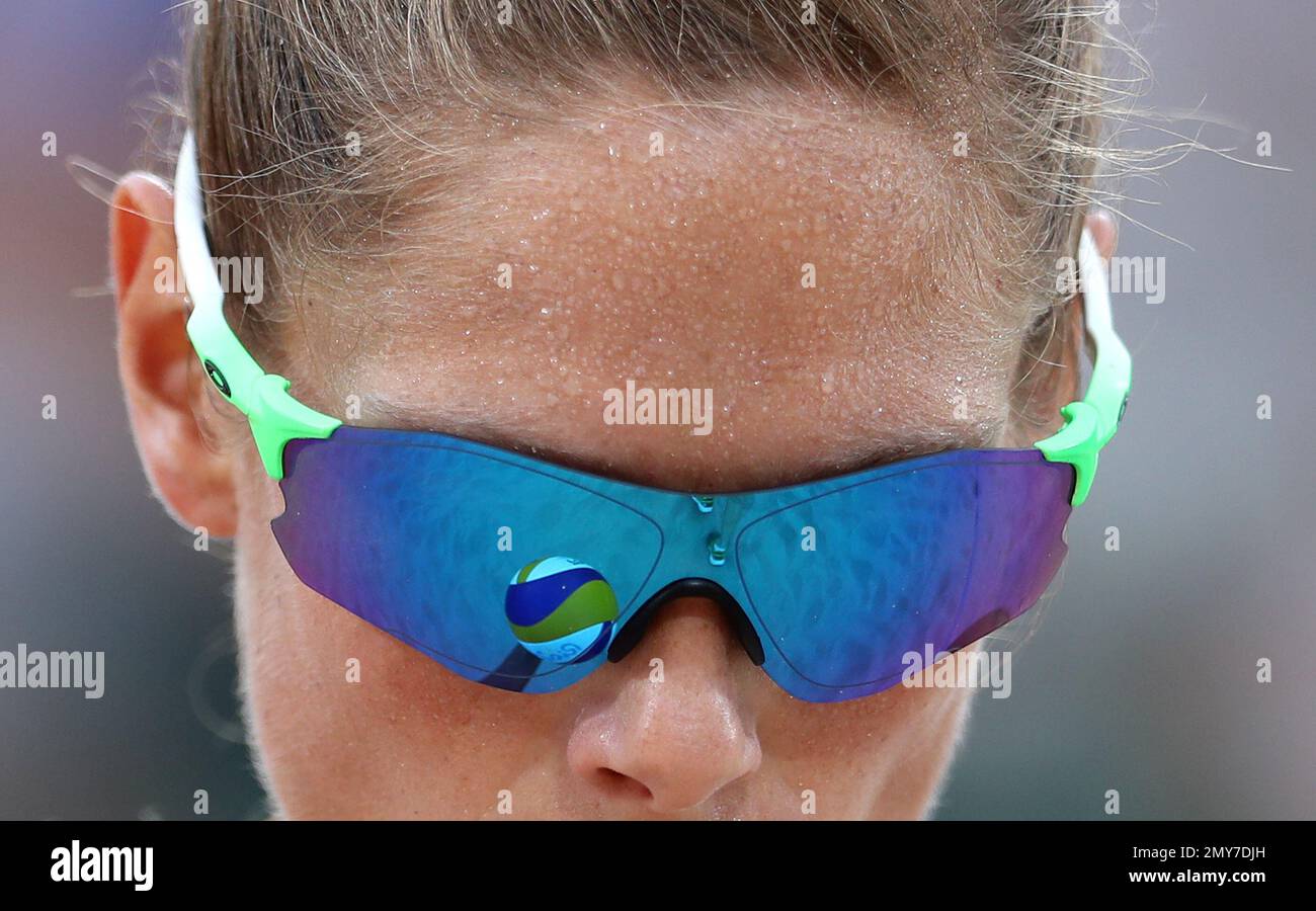 Canada's Sarah Pavan prepares to serve a ball during a women's beach ...
