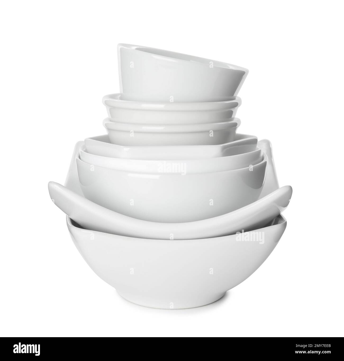 Stack of clean tableware isolated on white Stock Photo - Alamy