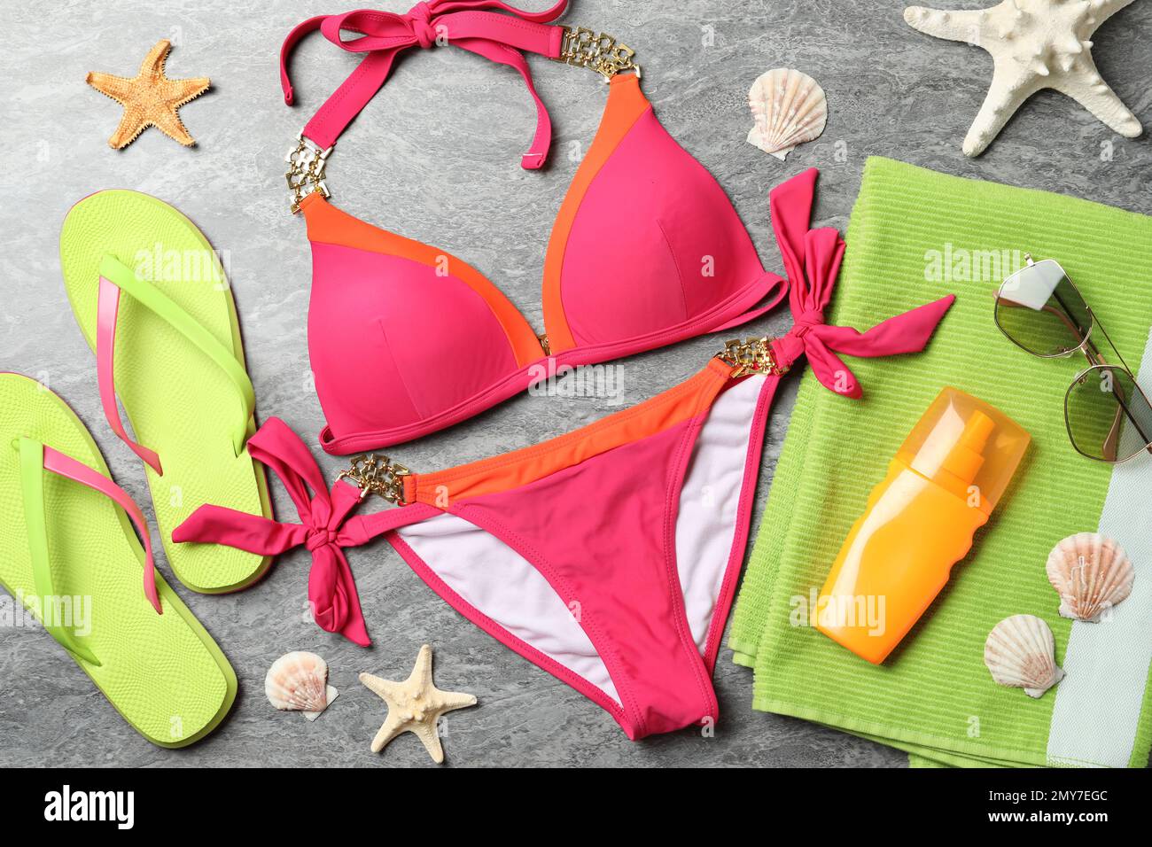 Flat lay composition with beach objects on grey stone background Stock ...