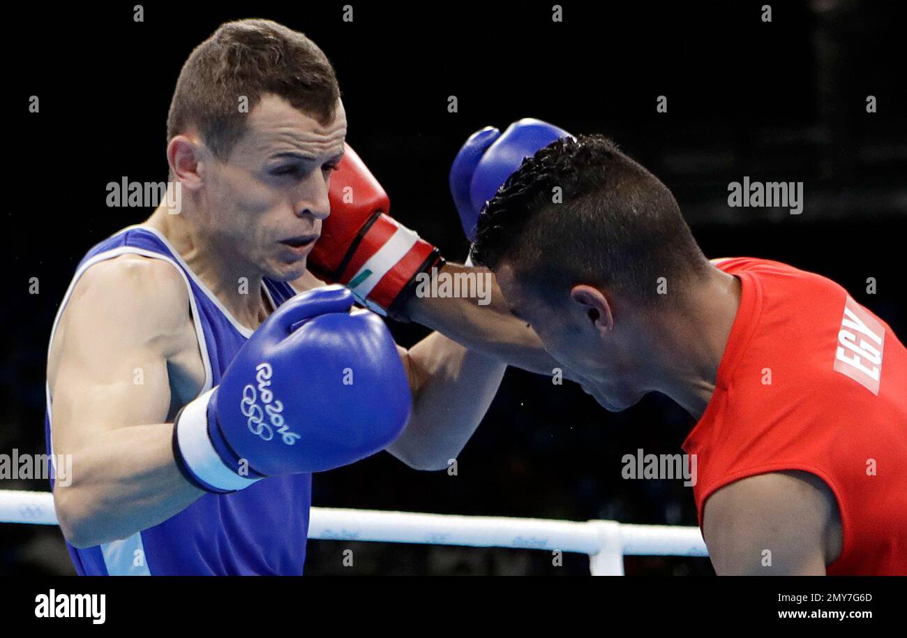 Egypt's Mahmoud Abdelaal fights Algeria's Reda Benbaziz during a men's ...