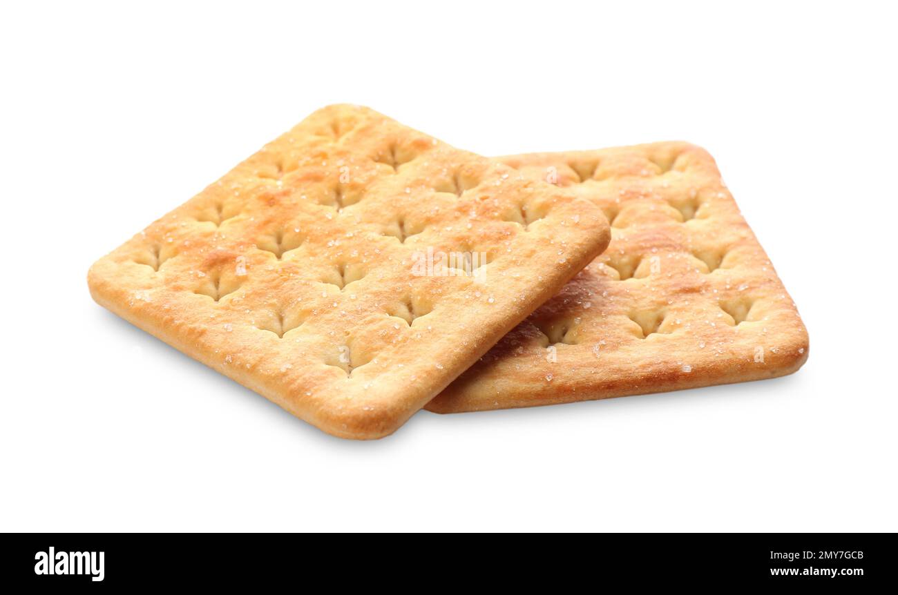 Crispy crackers isolated on white. Delicious snack Stock Photo - Alamy