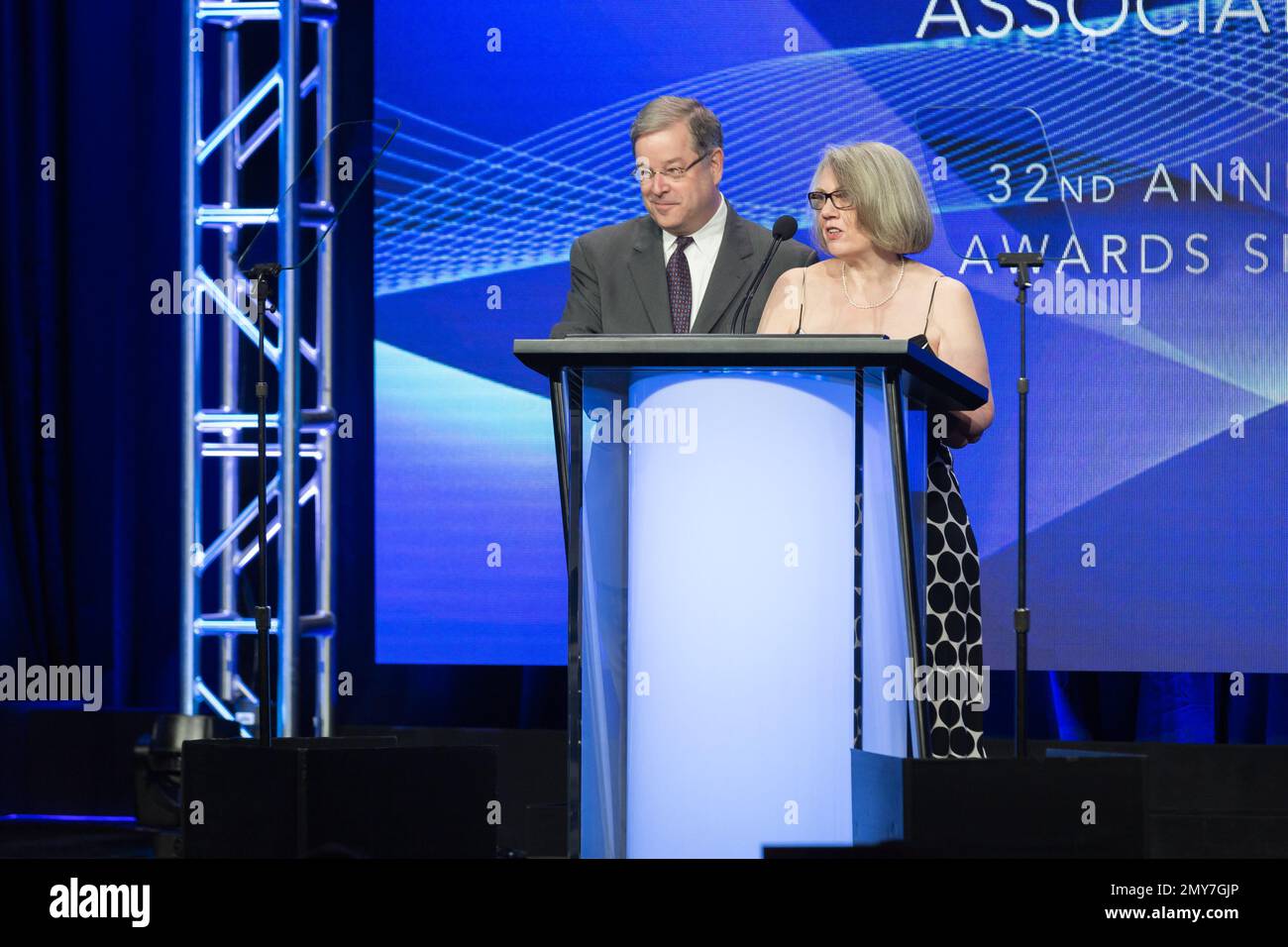 Matt Roush, left, and Ellen Gray present the Career Achievement Award ...