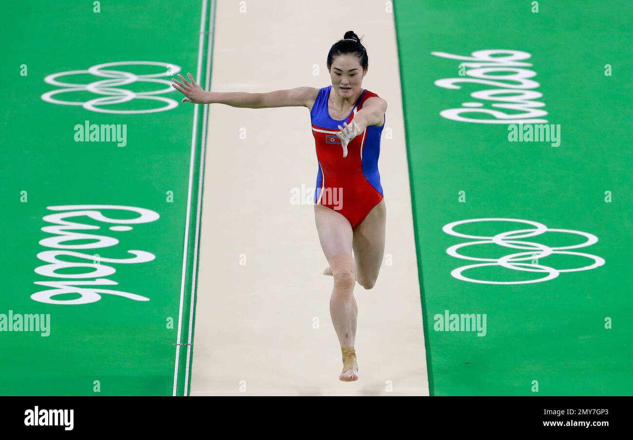 North Korea's Hong Un Jong performs on the vault during the artistic ...
