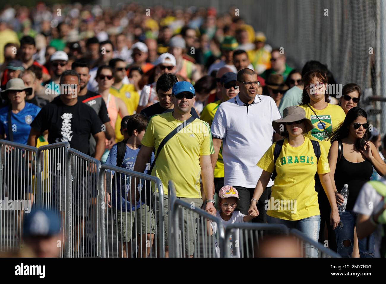 Spectators arrive at Olympic Park at the 2016 Summer Olympics in Rio de ...