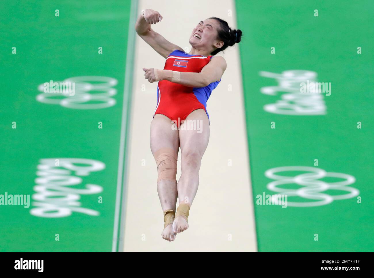North Korea's Hong Un Jong performs on the vault during the artistic ...