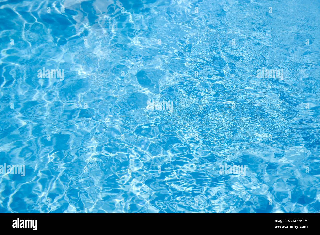 Texture of blue water in swimming pool as background, closeup Stock ...