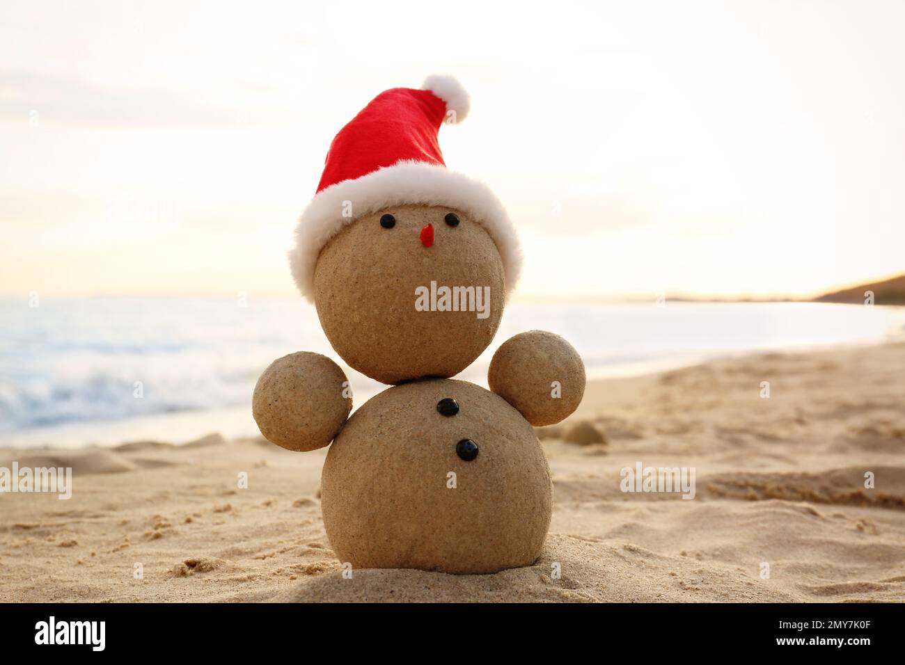 Snowman made sand on beach hi-res stock photography and images - Alamy