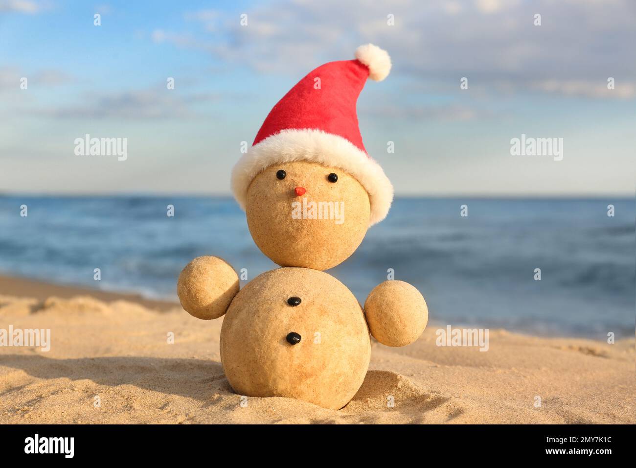 Snowman made sand on beach hi-res stock photography and images - Alamy