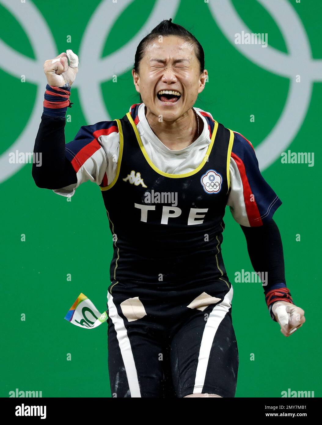 Wei-Ling Chen, of Chinese Taipei, celebrates after a successful lift in ...