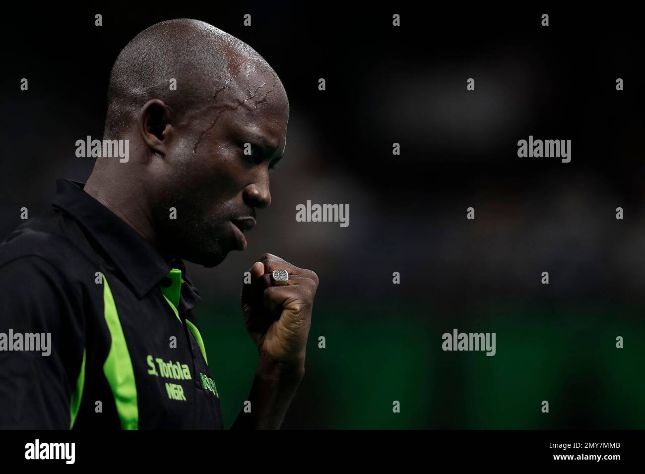 Nigeria's Segun Toriola celebrates a winning point against Dmitrij ...