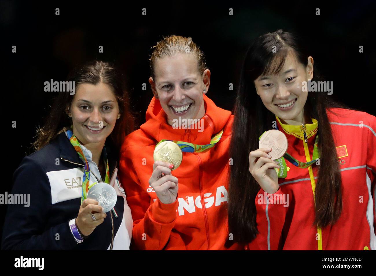 Gold medalist Emese Szasz, center, of Hungary, poses with silver medal ...
