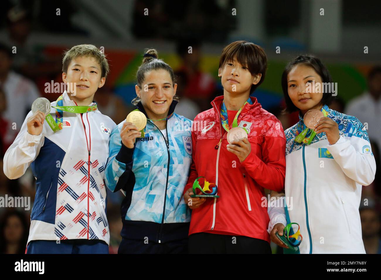 Gold medal winner Argentina's Paula Pareto, 2. from left, poses with ...
