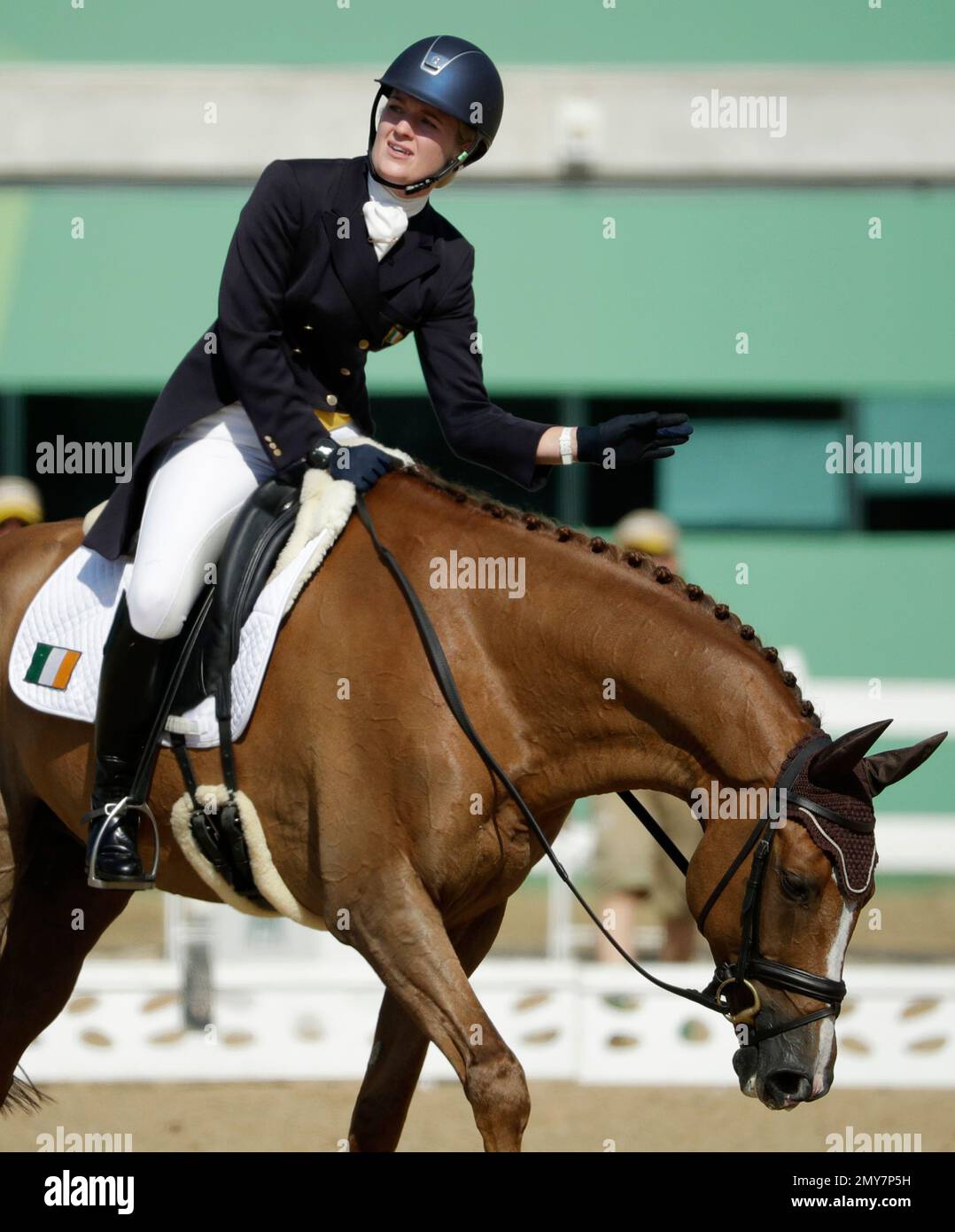 Clare Abbott, of Ireland, reacts while riding Euro Prince after ...