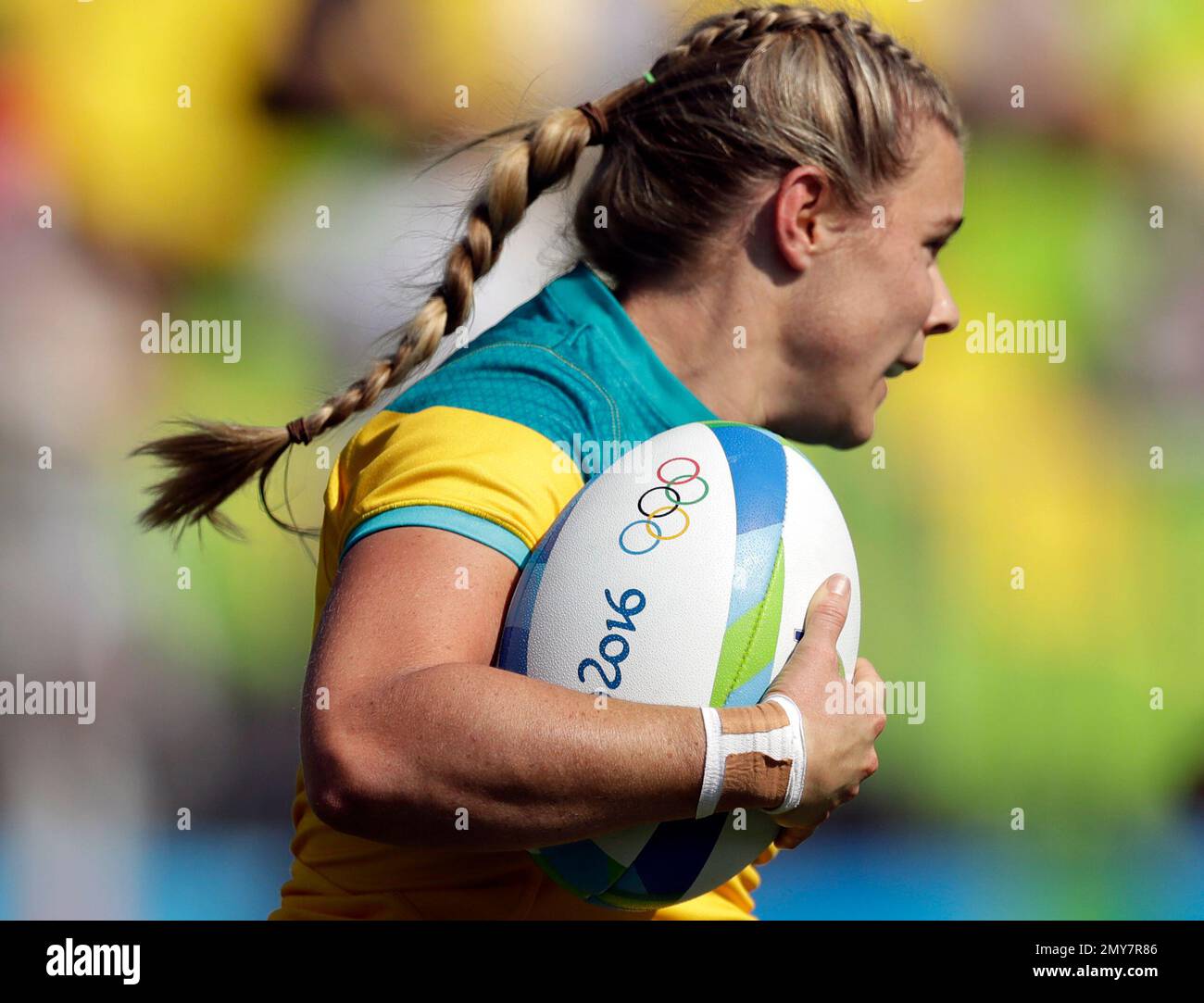 Australia's Nicole Beck, holds the ball after scoring a try during the ...