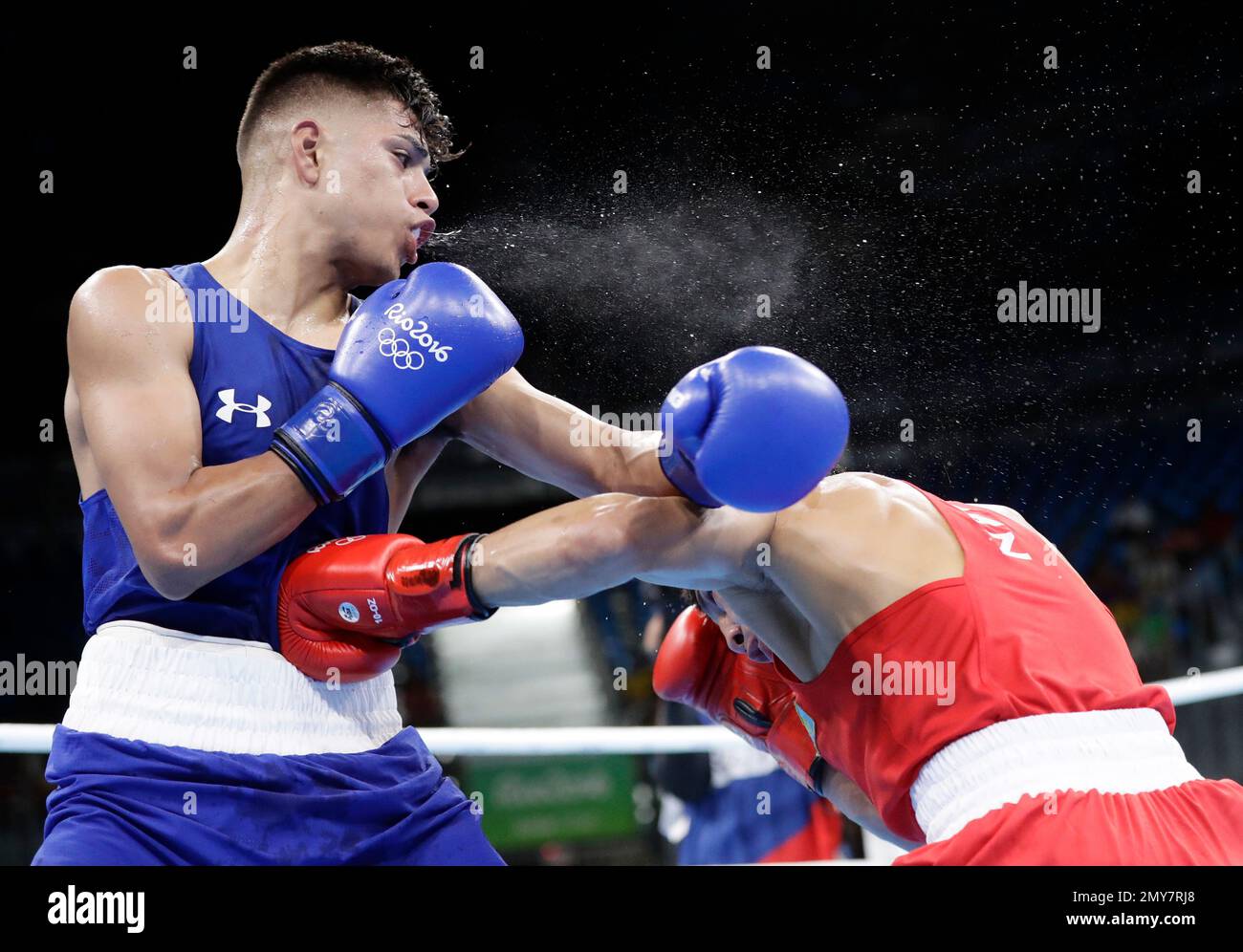 United State's Carlos Zenon Balderas Jr., left, fights Kazakhstan's ...