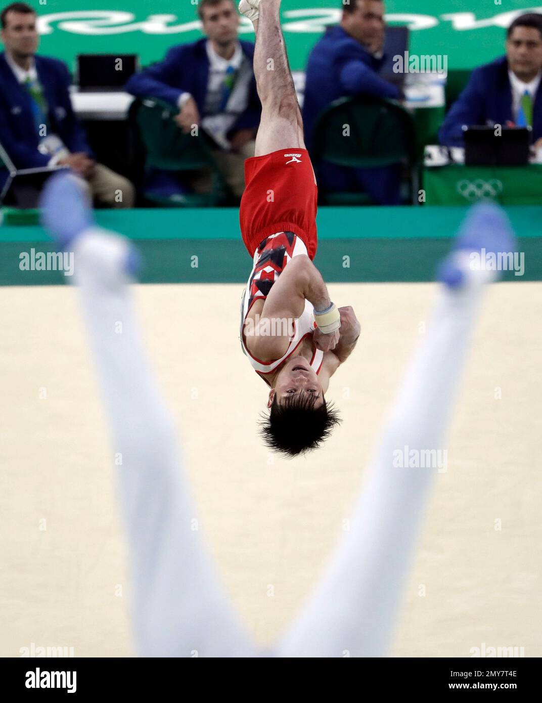 Japan's Kohei Uchimura is airborne during his floor routine during the ...