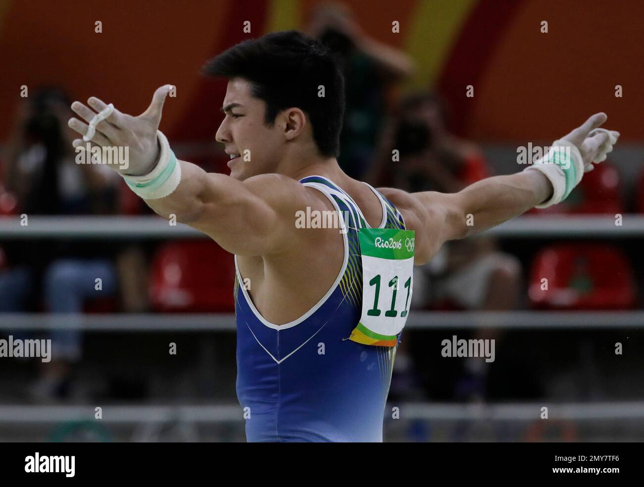 Brazil's Arthur Mariano reacts after performing on the horizontal bar during the artistic ...
