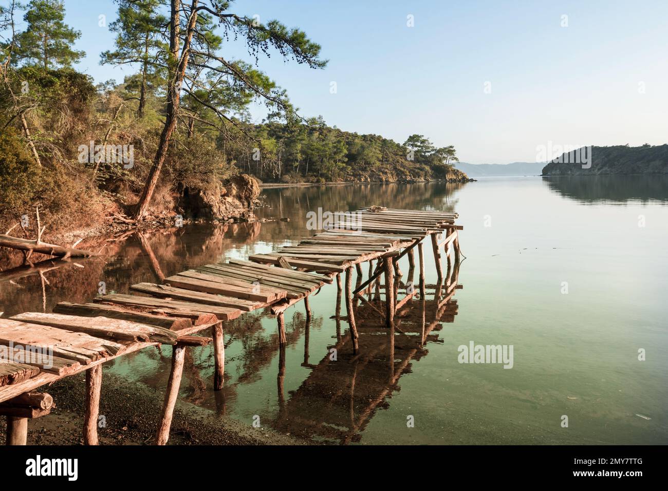 Wooden pier in serenity mountains lake Stock Photo - Alamy