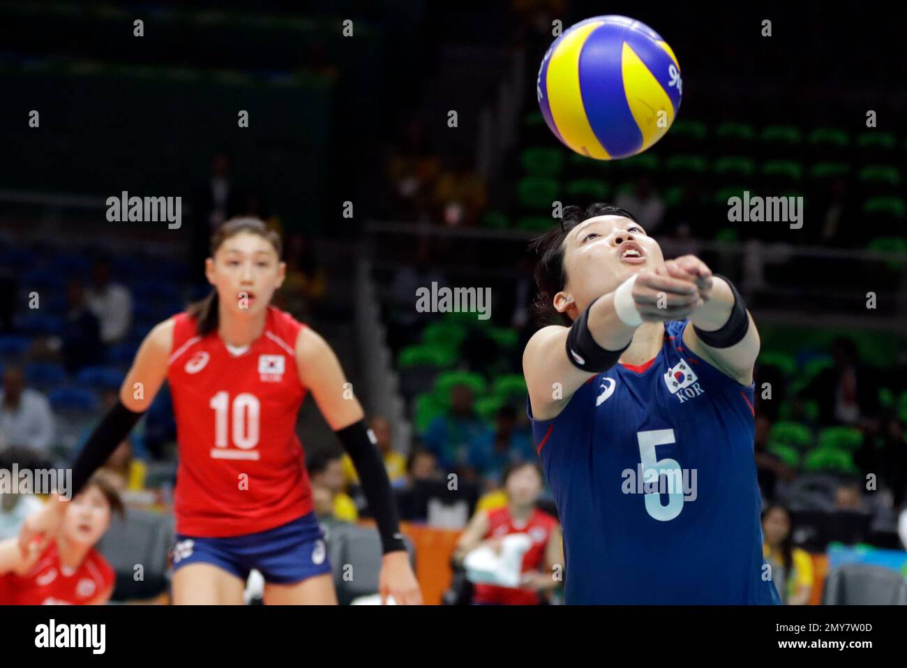 South Korea's Kim Hae-Ran (5) reaches for the ball as Kim Yeon-Koung ...