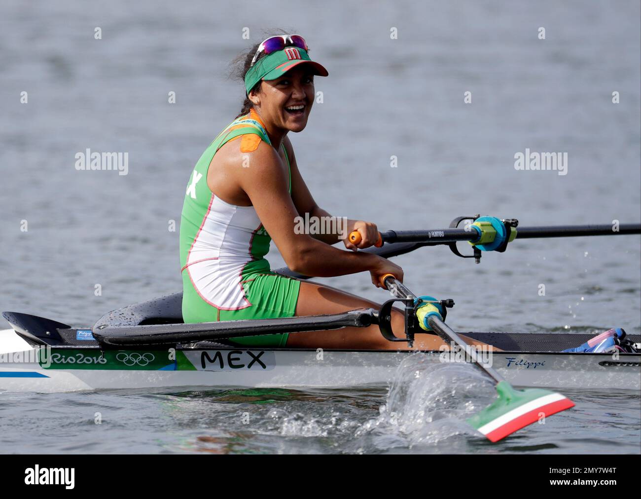 Kenia Lechuga Alanis, of Mexico, smiles after competing in the women's ...