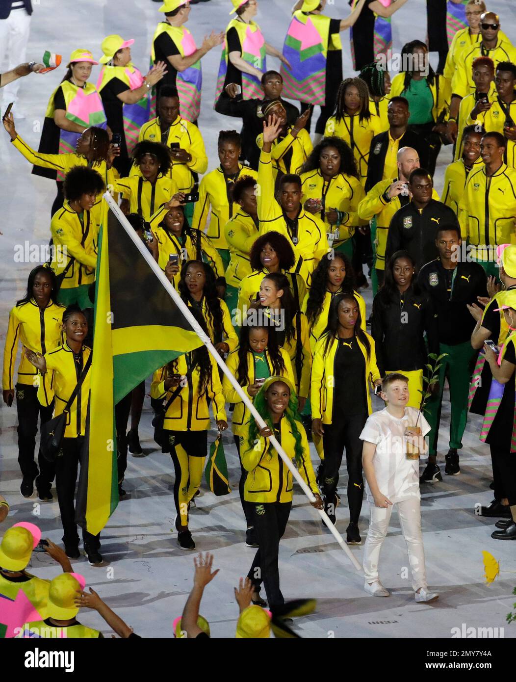 Shelly-Ann Fraser-Pryce carries the flag of Jamaica during the opening ...