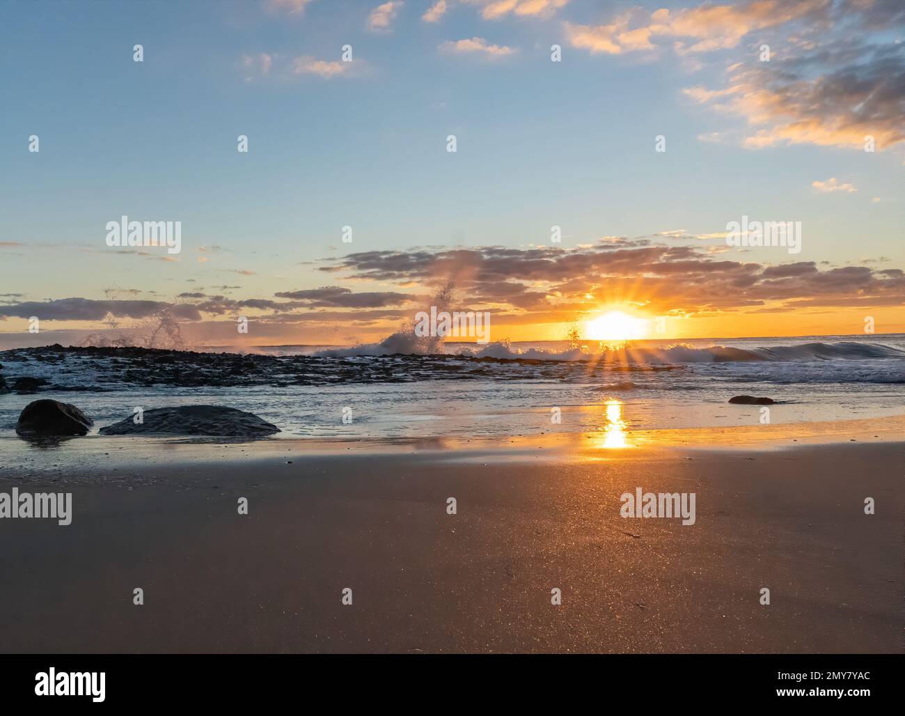 Waves from the Atlantic Ocean crash on the fossilized coral rocks of ...