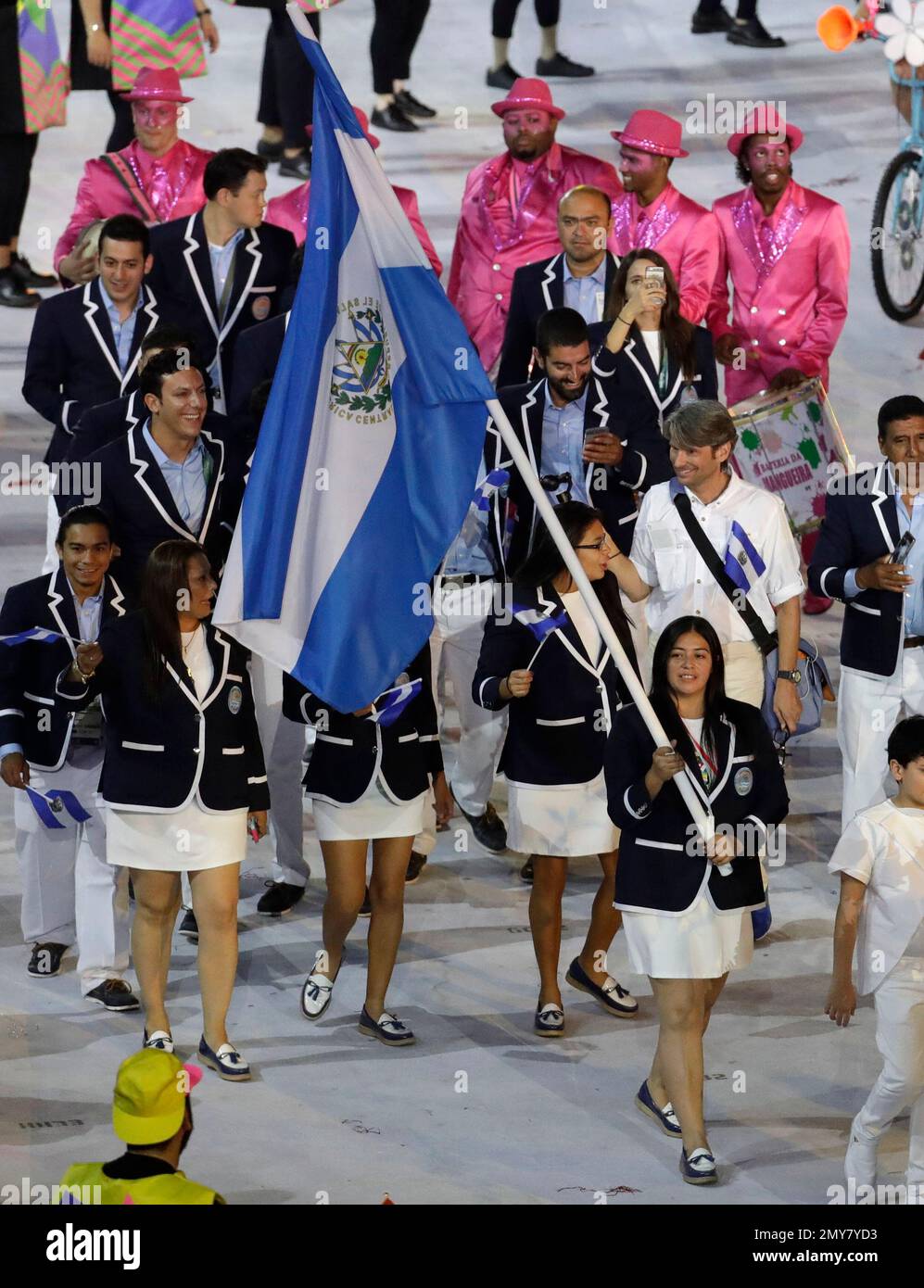 Lilian Castro carries the flag of El Salvador during the opening ...