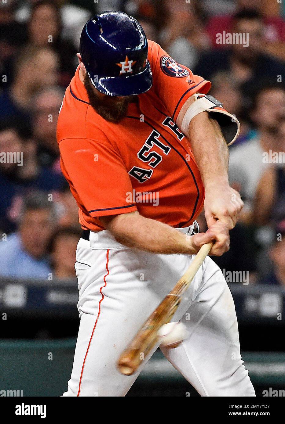 Houston Astros designated hitter Evan Gattis hits a single during the ...