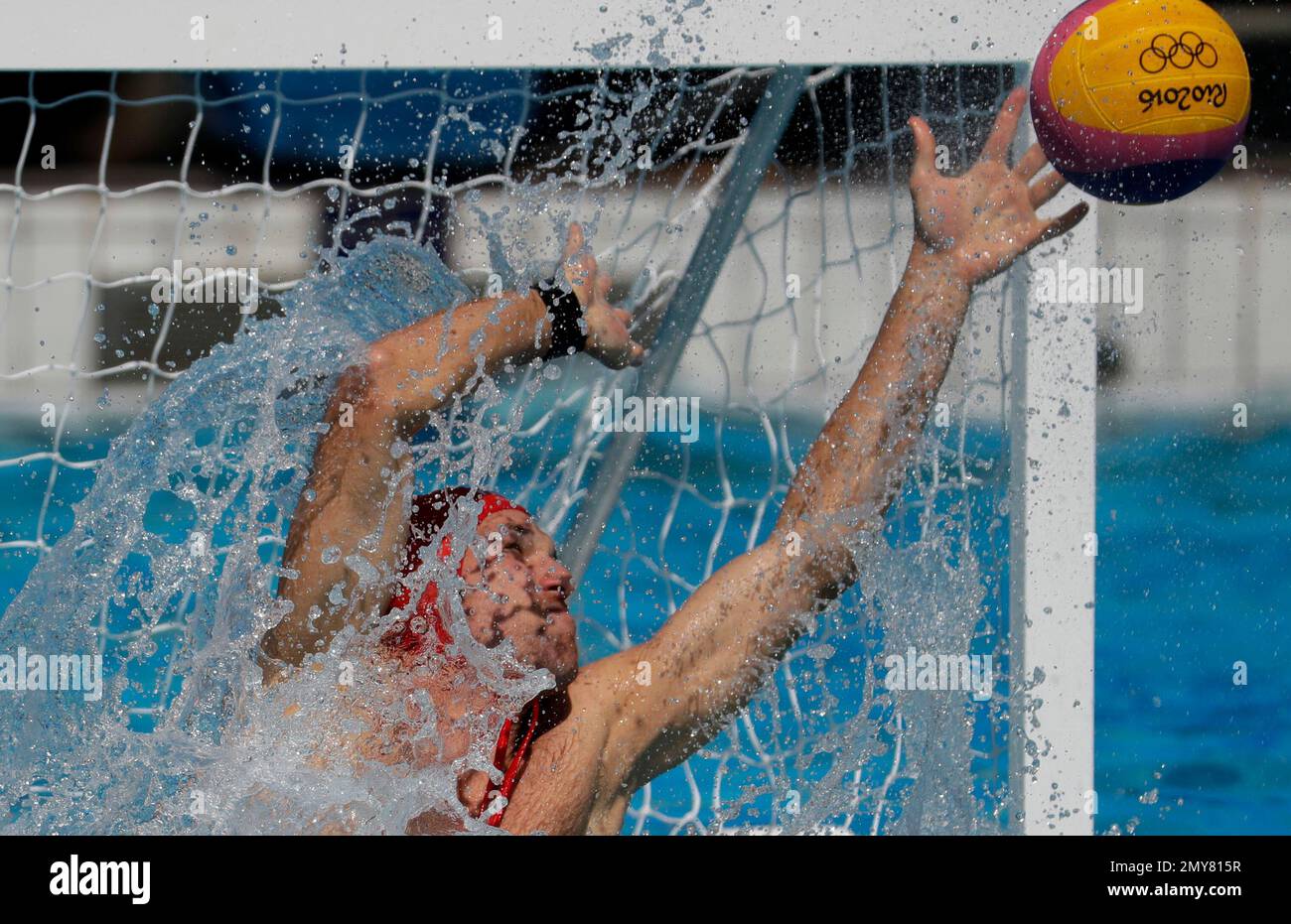 Hungary's Viktor Nagy, attempts a save during a water polo training ...