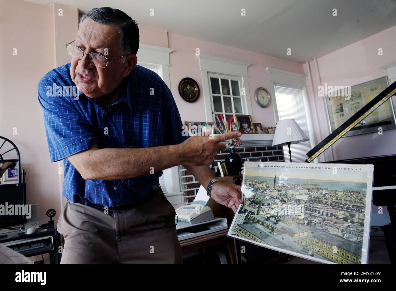 FILE – In this Aug. 27, 2014, file photo, piano tuner Charlie Birnbaum ...