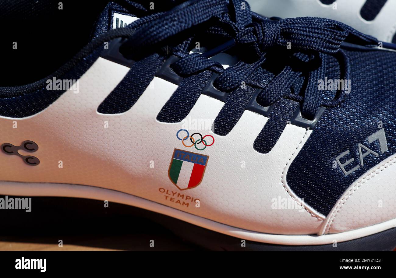 A shoe of a member of Italy's beach volleyball team is placed at a ...