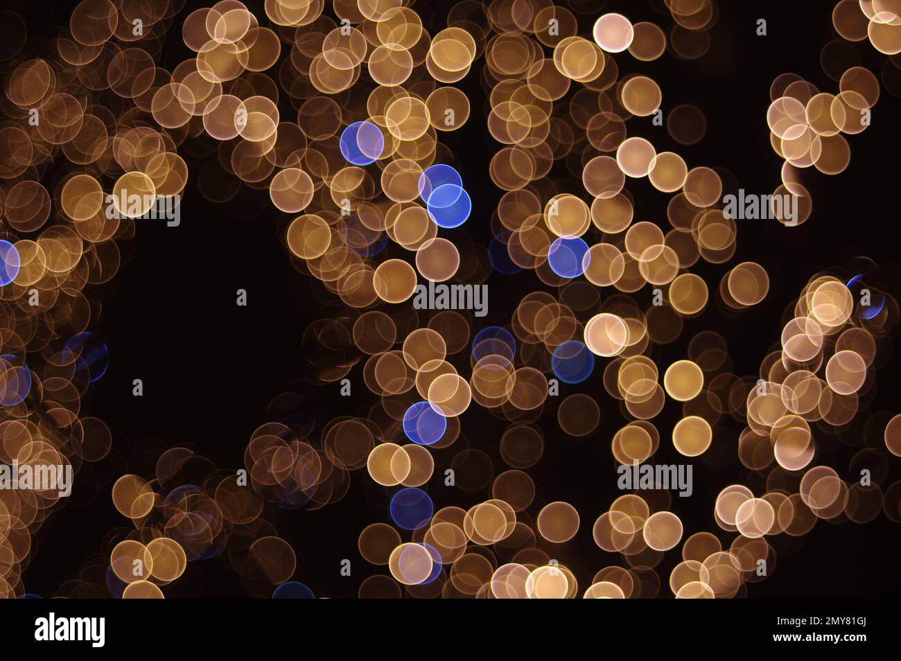 Explosion golden bokeh, particles lights Stock Photo - Alamy