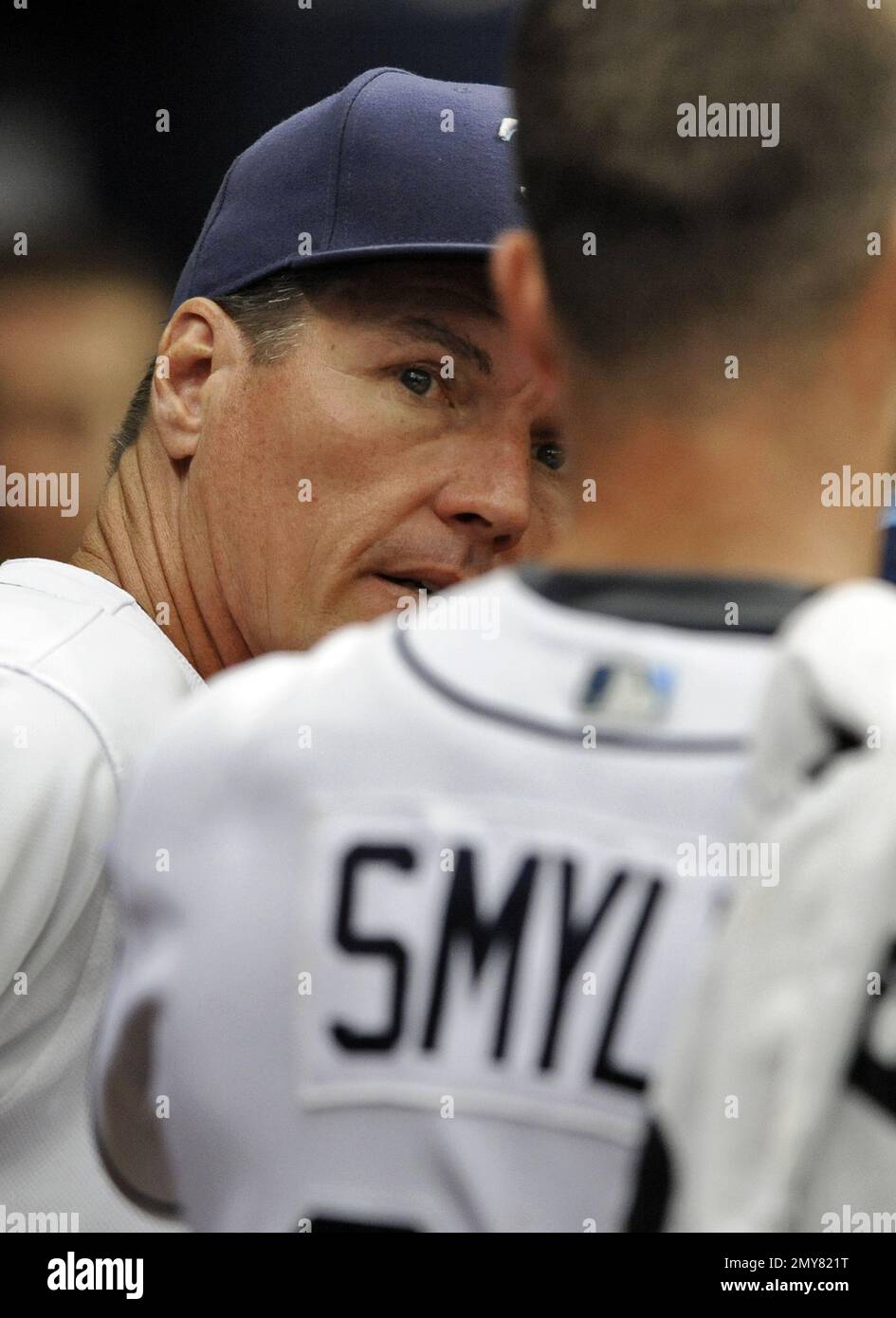 Tampa Bay Rays pitching coach Jim Hickey, left, talks with starting ...